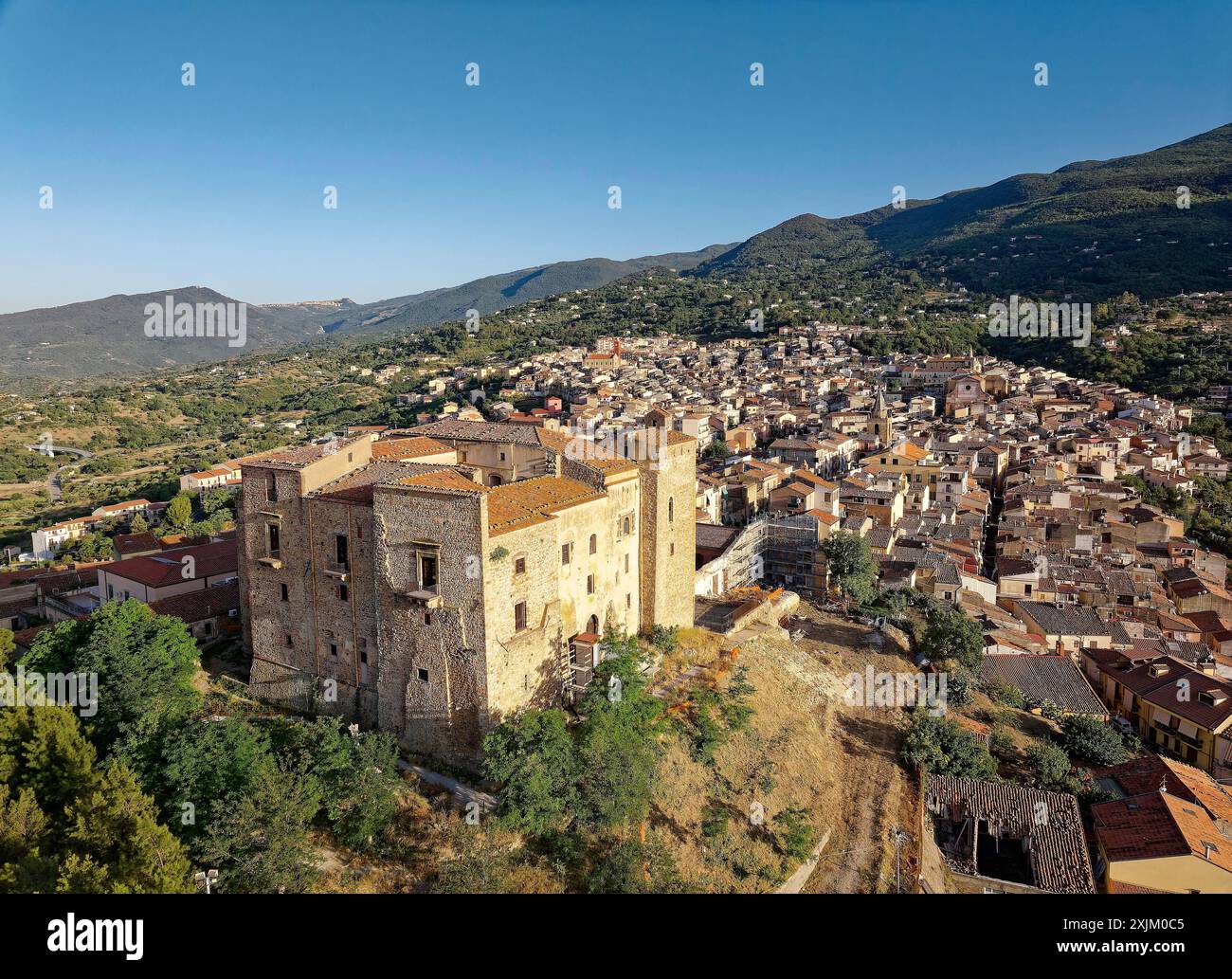 The medieval castle and the historic centre of the Sicilian town of ...