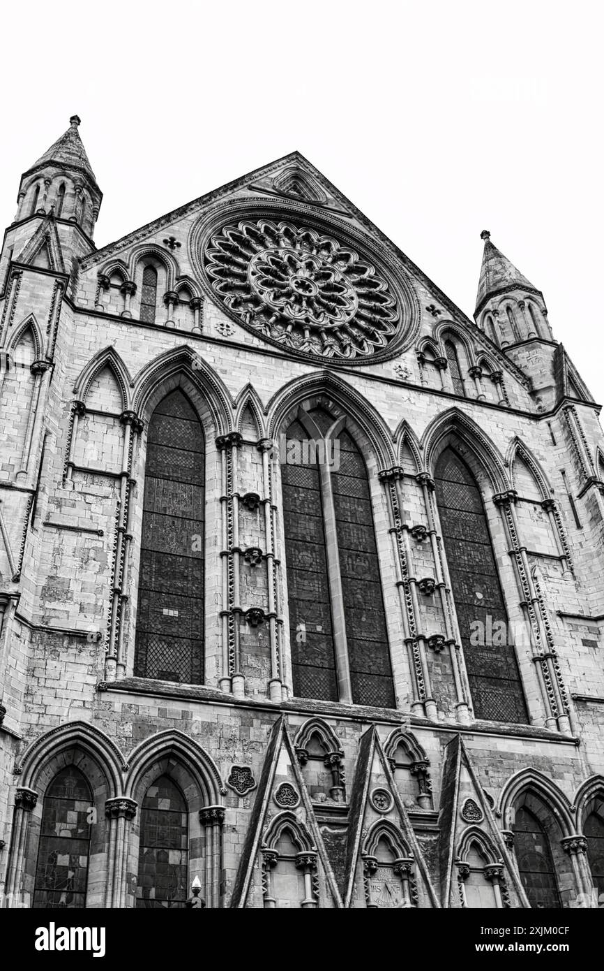 Black and white photo of a Gothic cathedral facade with pointed arches ...