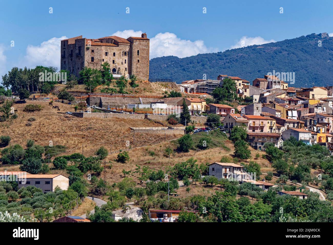 The medieval castle on a hill and the historic centre of the Sicilian ...