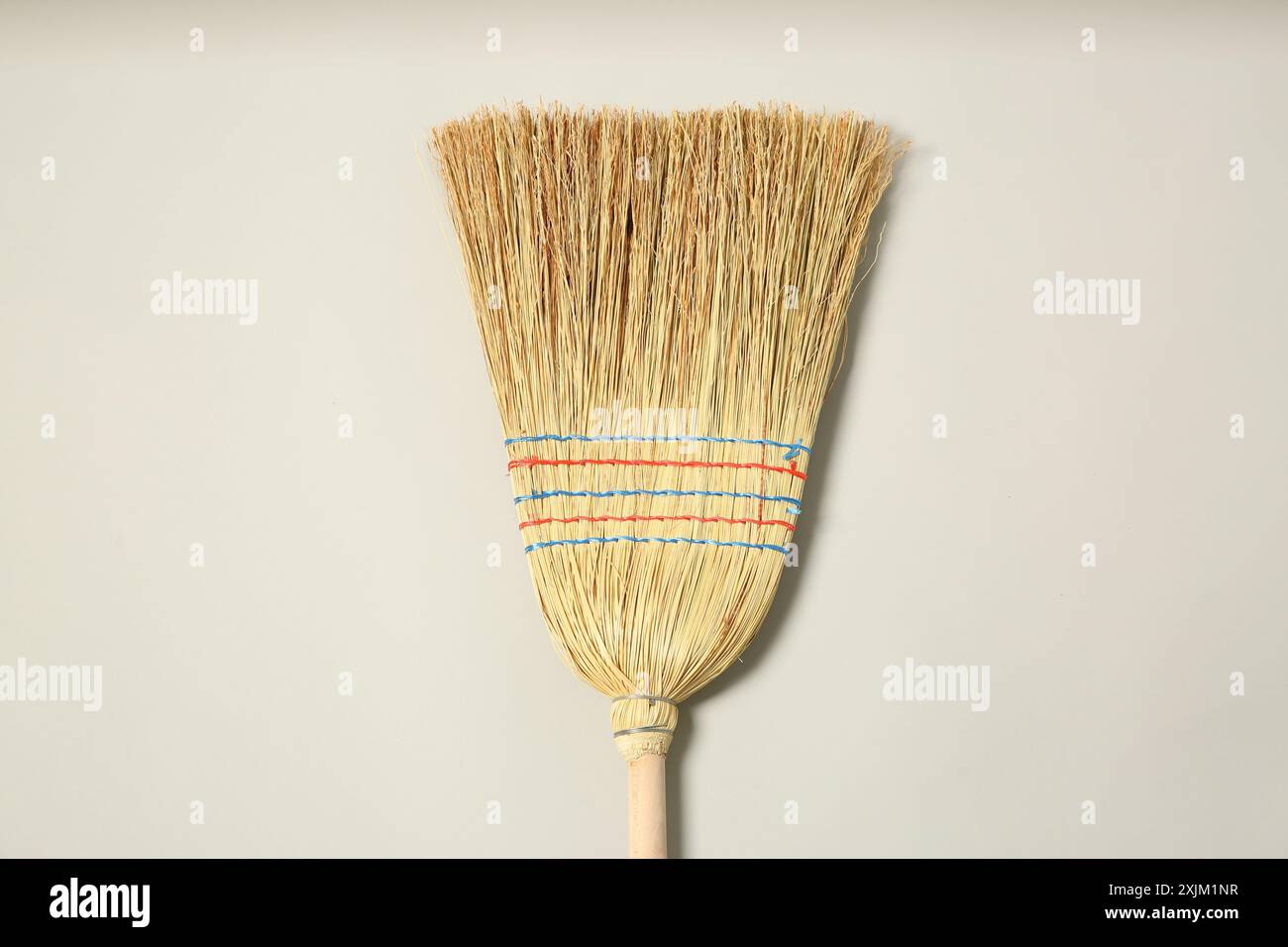 One corn straw broom on grey background, top view Stock Photo - Alamy