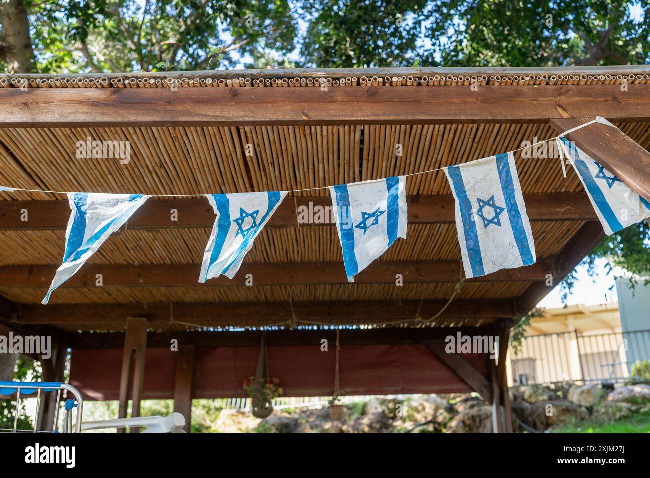 Israeli flags on display at wooden pavilion celebrate national pride ...