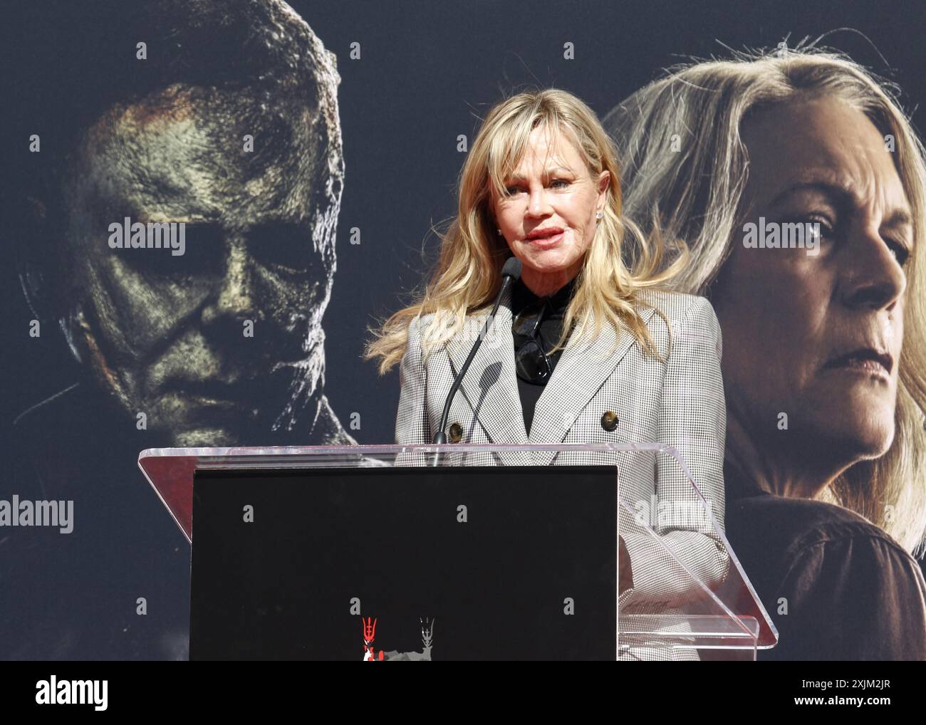 Melanie Griffith at Jamie Lee Curtis hand and footprint in cement ...