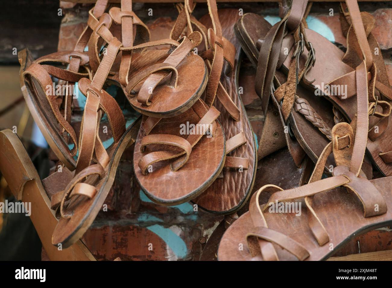 Handmade leather sandals as a background Stock Photo - Alamy