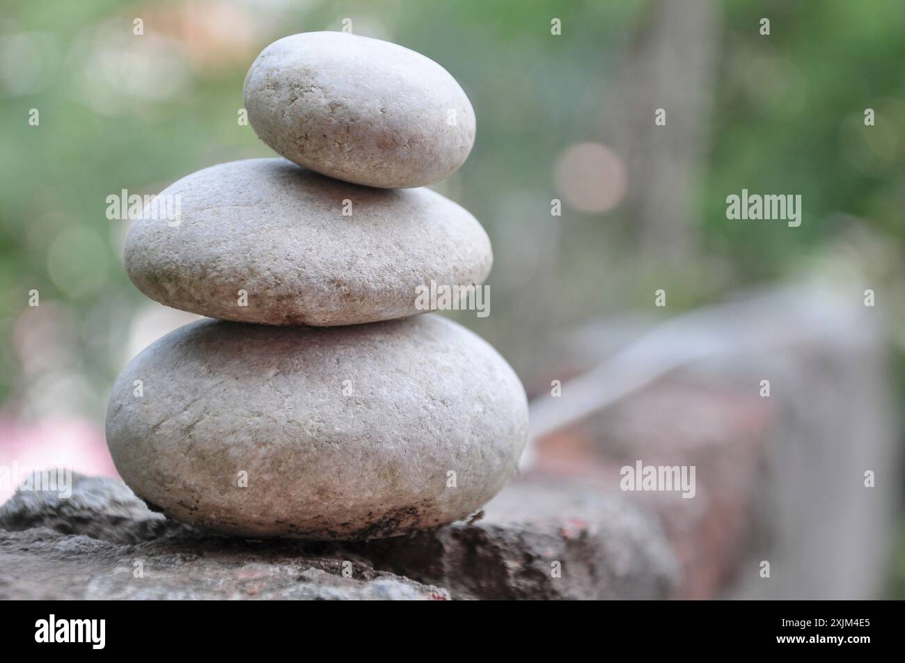 stack of white pebble stones on balance Stock Photo - Alamy