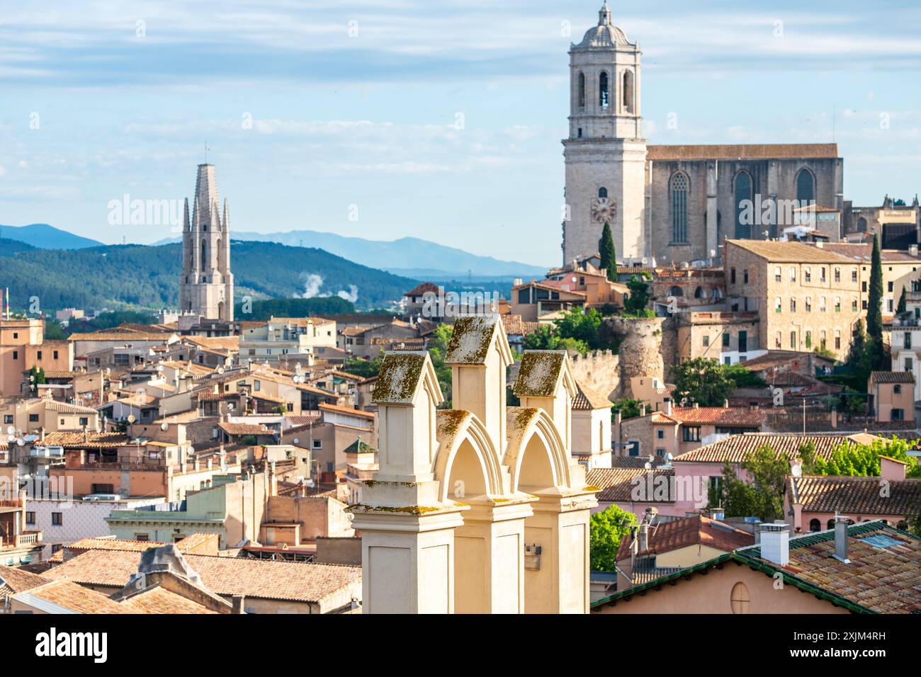 A view of Girona Cathedral From City Walls Spain and the roof tops in the early morning light ...
