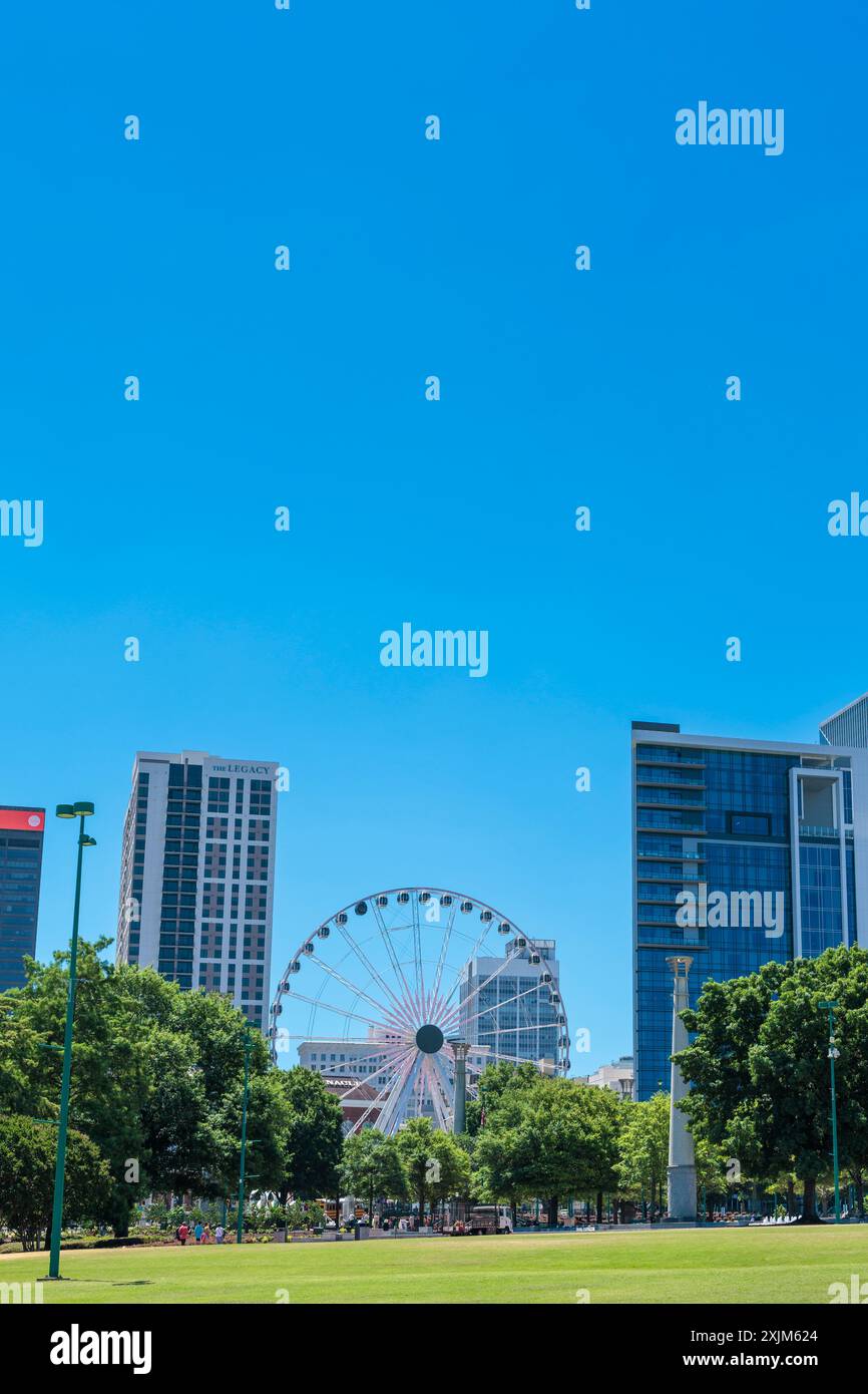 Ferris wheel, SkyView Atlanta, and tall modern buildings viewed from ...