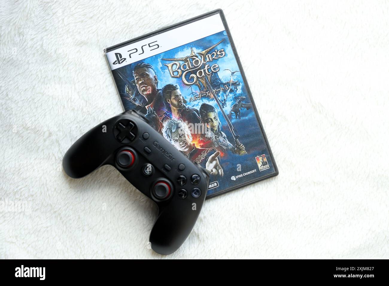 KYIV, UKRAINE - JUNE 26, 2024 Baldur's Gate 3 PS5 video game disc box ...