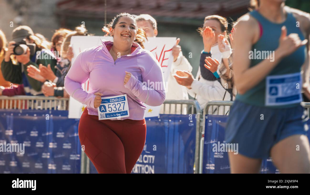 Plus size female marathon runner hi-res stock photography and images ...