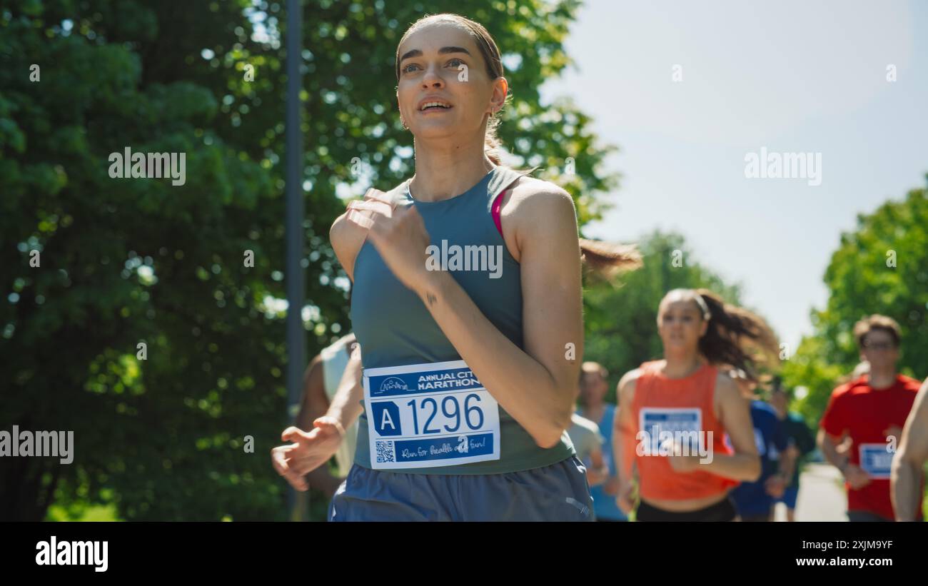 Woman training marathon focused hi-res stock photography and images - Alamy