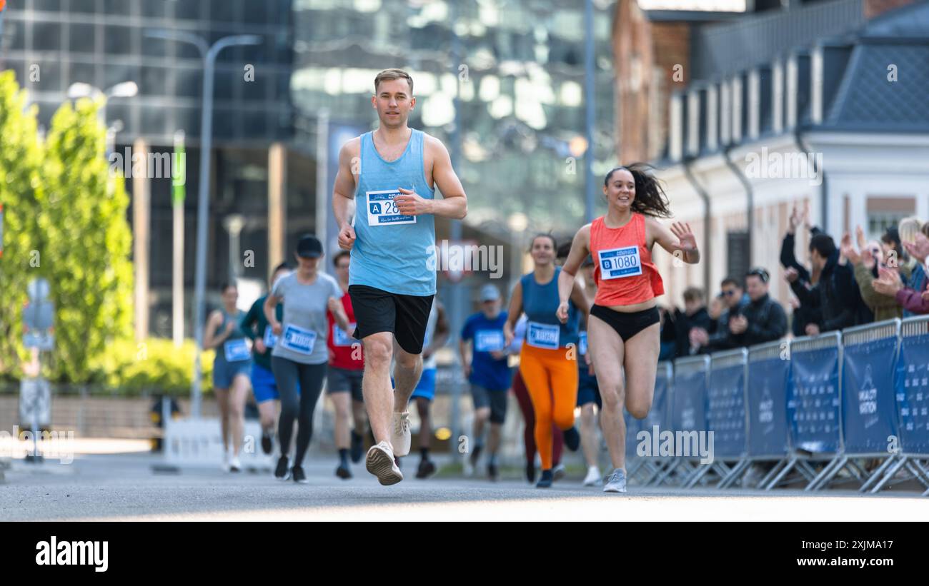 Happy Group of People Participating in a City Marathon. Diverse Race ...