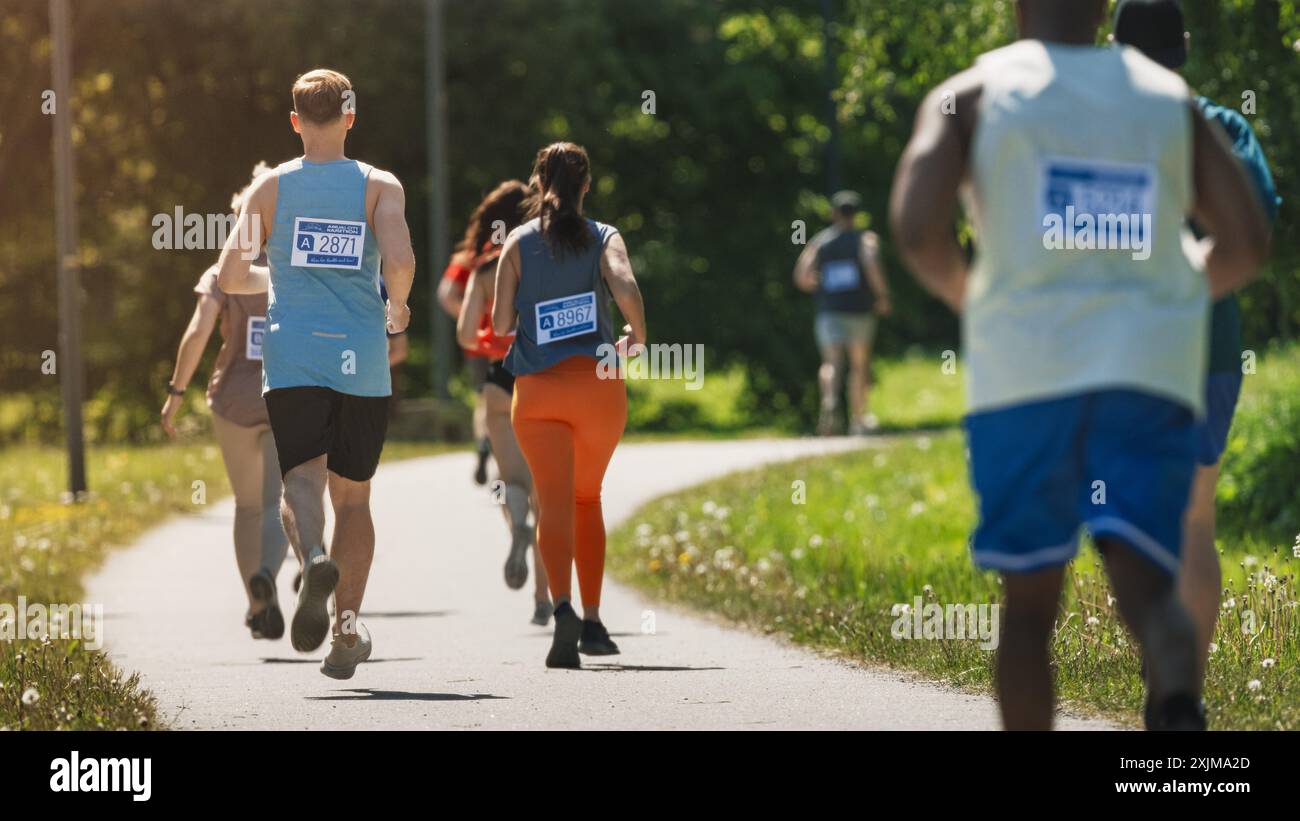 Wide Shot Back View of Diverse Marathon Participants Competing in a ...