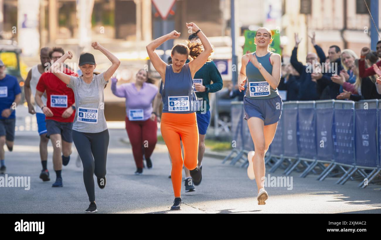 Women Supporting Women: Portrait of Happy Female Runners Participating ...