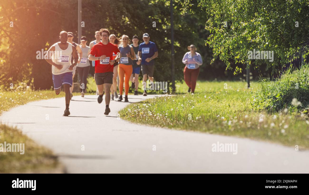 Wide Shot of Diverse Marathon Participants Competing in a Race for the ...