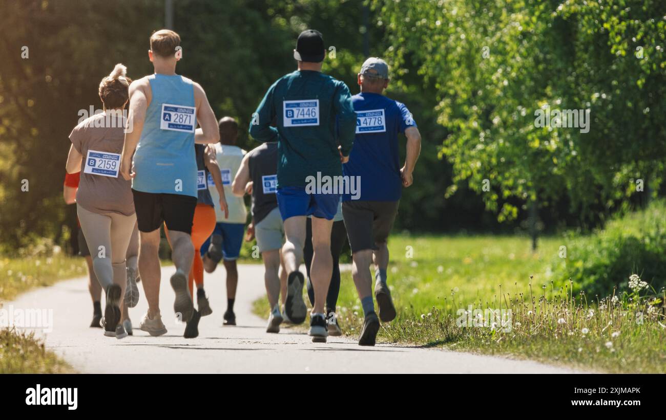 Wide Shot Back View of Diverse Marathon Participants Competing in a ...