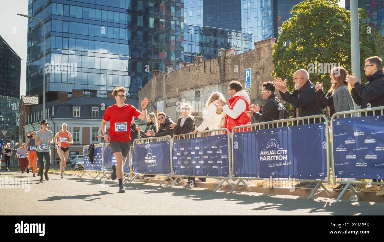 Diverse People Running in a Marathon and Waving to their Loved Ones and ...