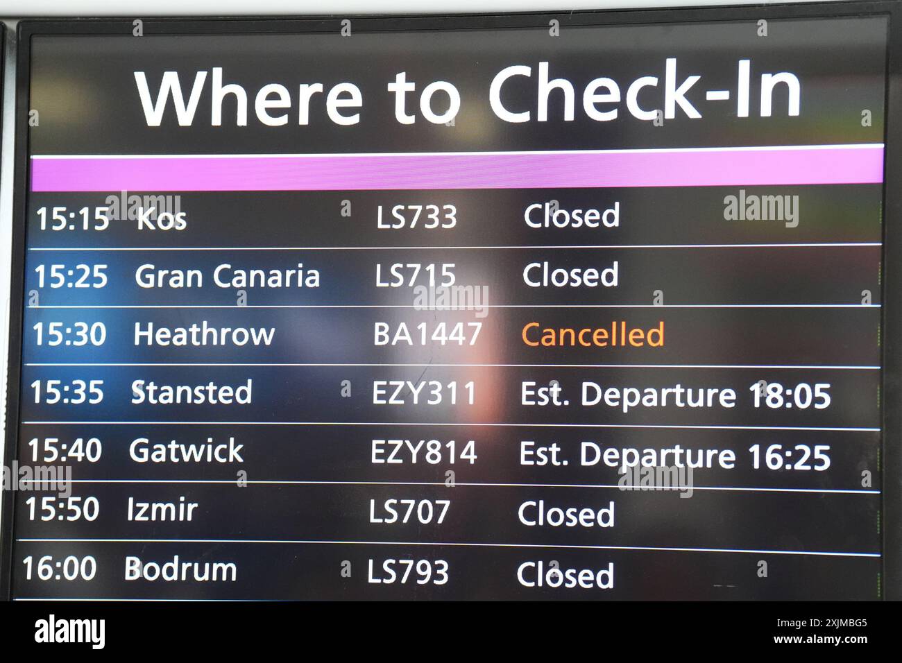 A check-in display at Edinburgh Airport, as widespread IT outages ...
