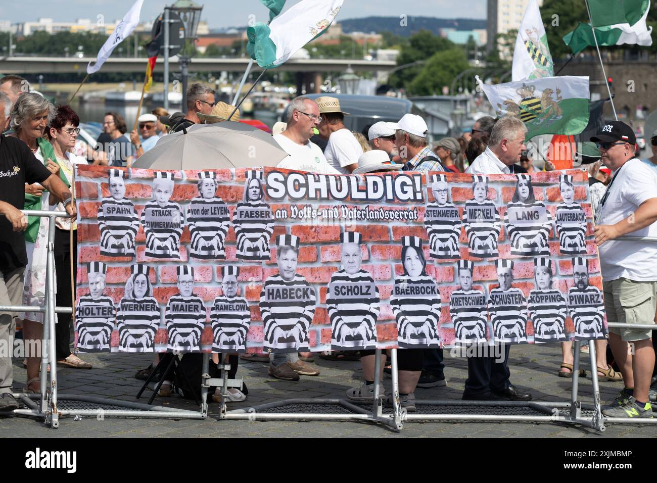 19 July 2024, Saxony, Dresden: Participants in a rally of the small ...