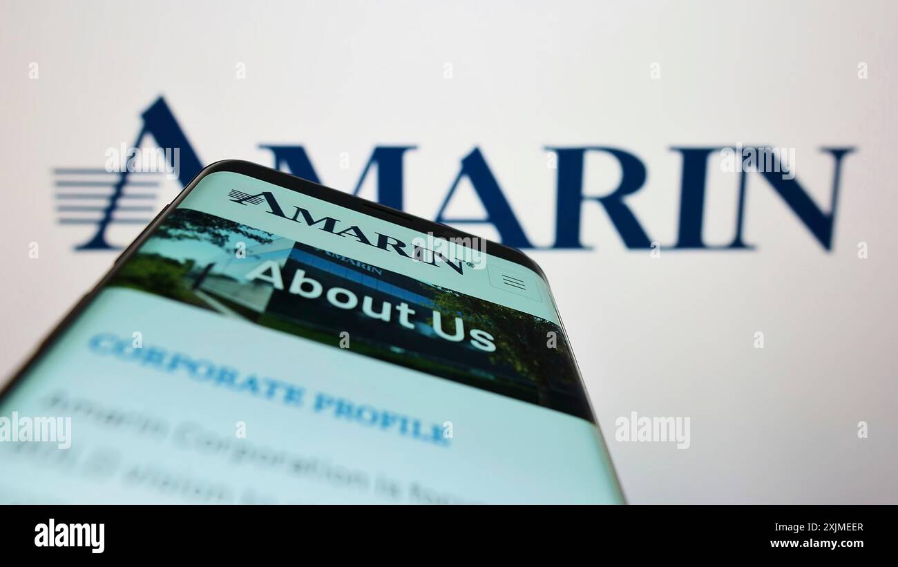 Stuttgart, Germany, 06-11-2022: Mobile phone with webpage of biopharmaceutical company Amarin ...