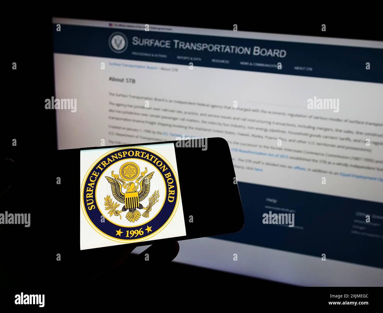 Stuttgart, Germany, 06-11-2022: Person holding cellphone with seal of ...