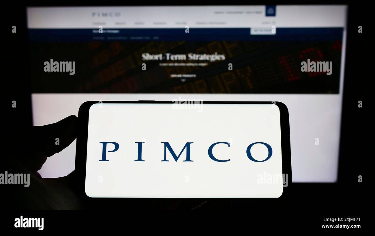 Stuttgart, Germany, 06-12-2022: Person holding cellphone with logo of ...