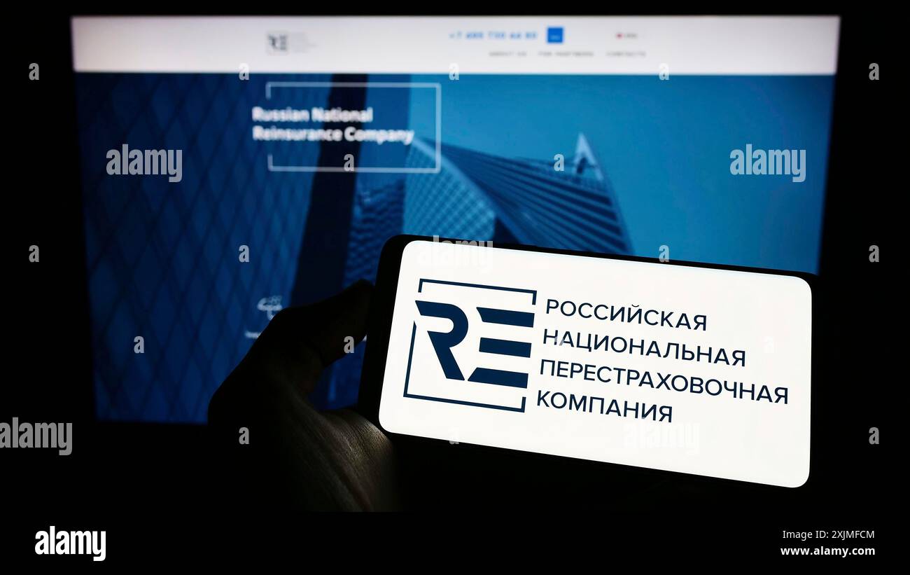 Stuttgart, Germany, 06-19-2022: Person holding mobile phone with logo ...