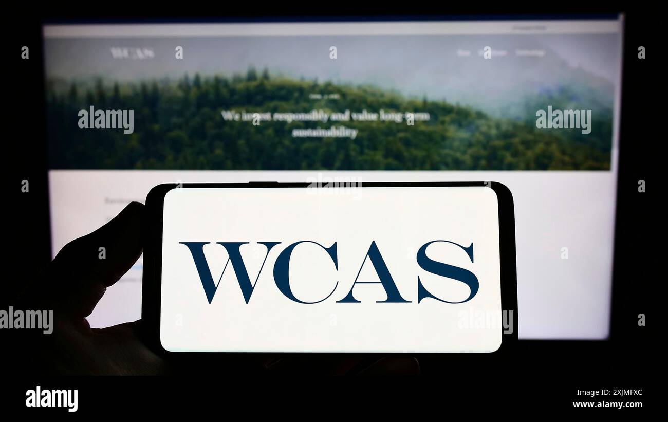 Stuttgart, Germany, 06-19-2022: Person holding smartphone with logo of ...