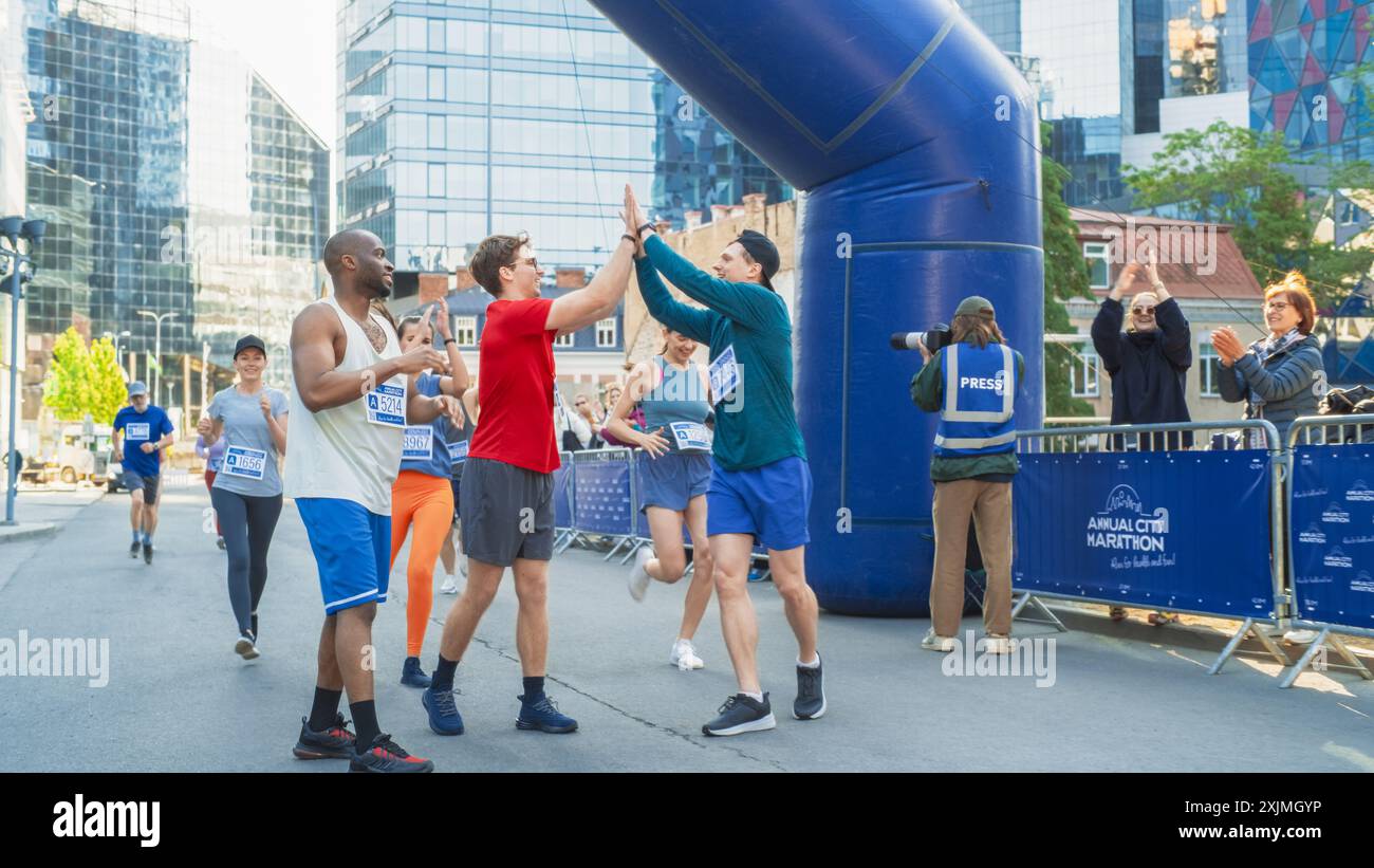 Portrait of a Smiling Group of People Participating in a City Marathon ...