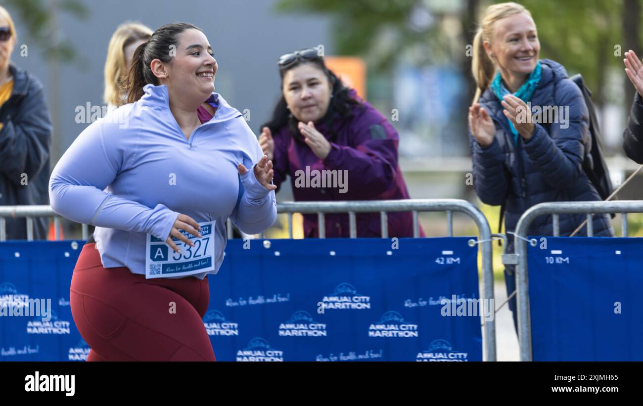 Plus size female marathon runner hi-res stock photography and images ...