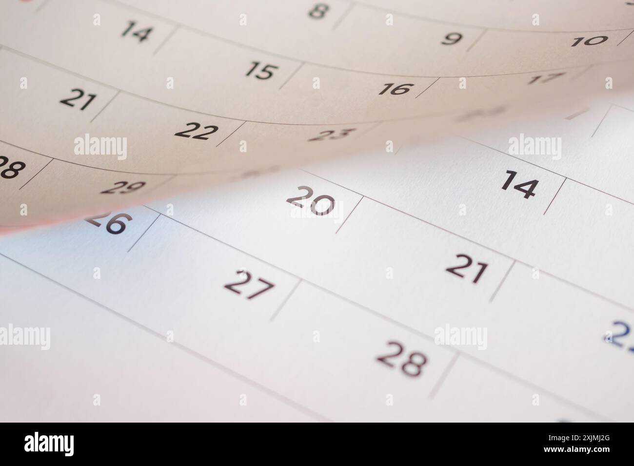calendar page flipping sheet close up background Stock Photo - Alamy