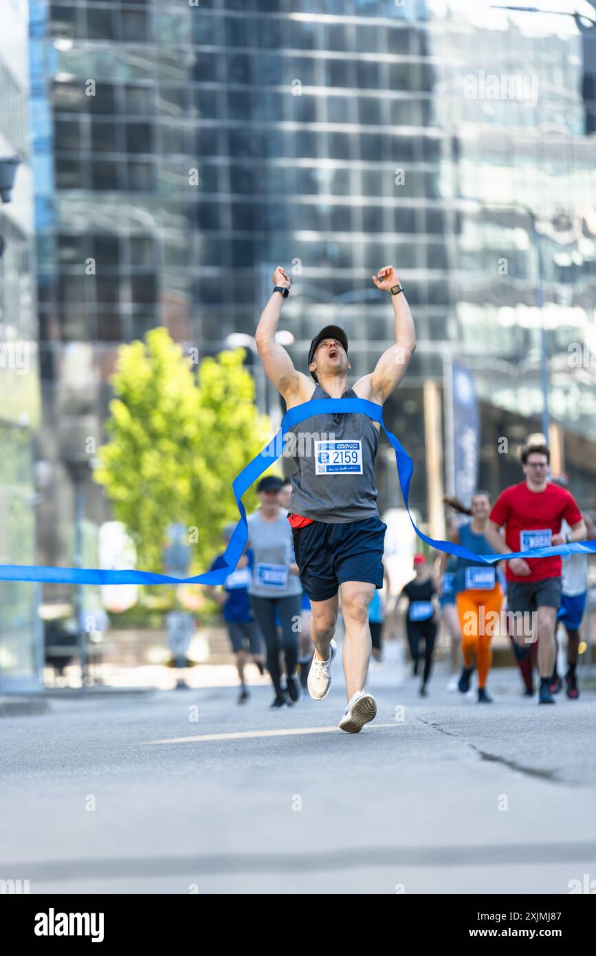 Portrait of Athletic Male Jogger Crossing the Finish Line in Marathon ...