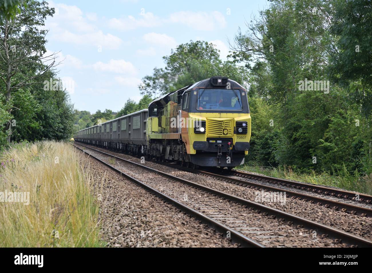 Colas Rail Class 70 70807 with a loaded rake of JNA Box Wagons from ...