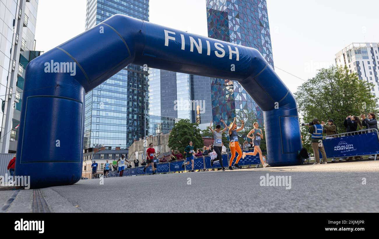 Smiling Group of People Participating in a City Marathon. Wide Shot of ...