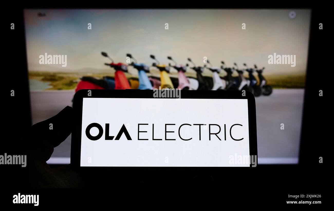 Stuttgart, Germany, 08-27-2022: Person holding smartphone with logo of ...