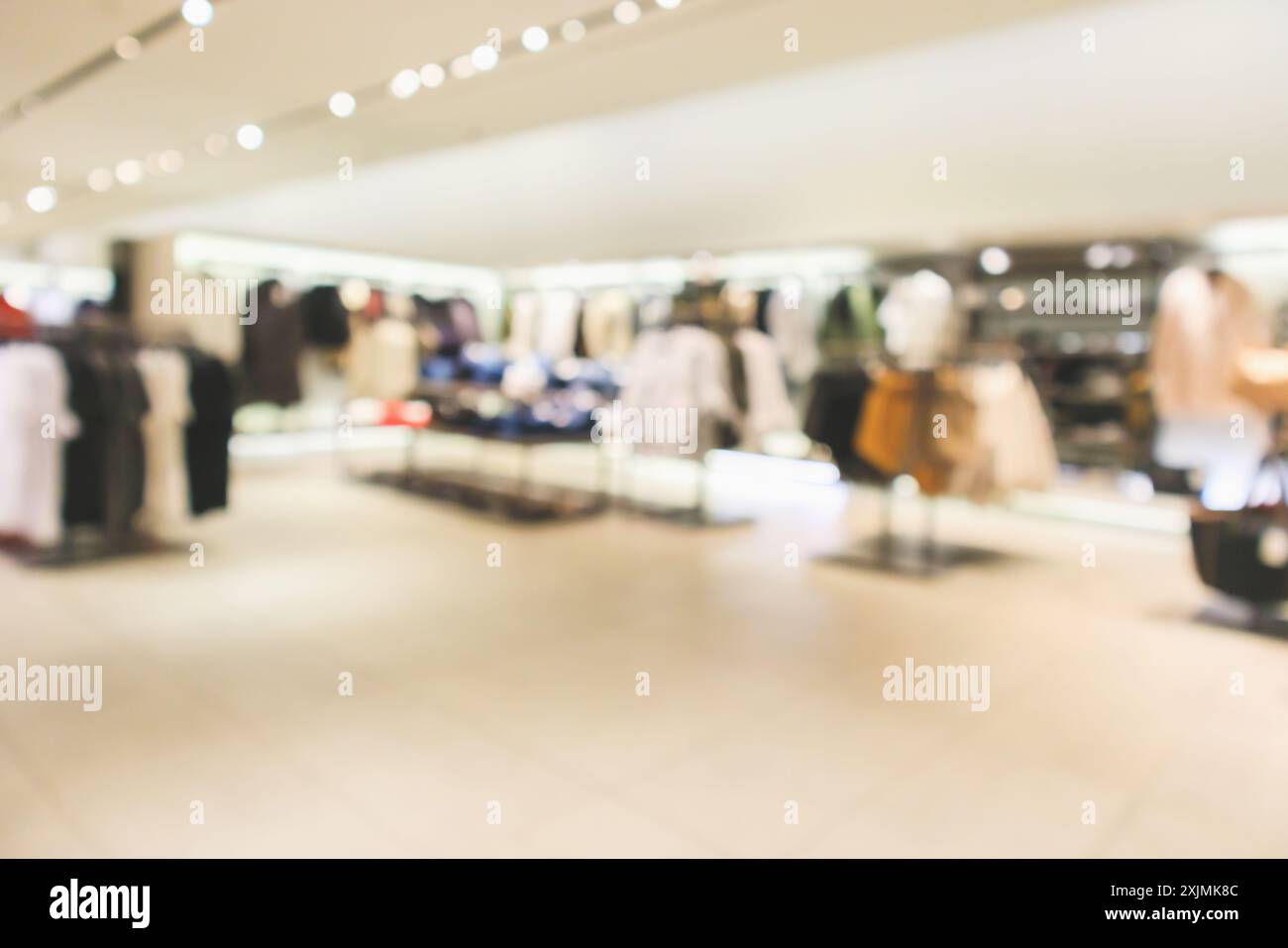 Abstract blur clothing boutique store display interior of shopping mall ...
