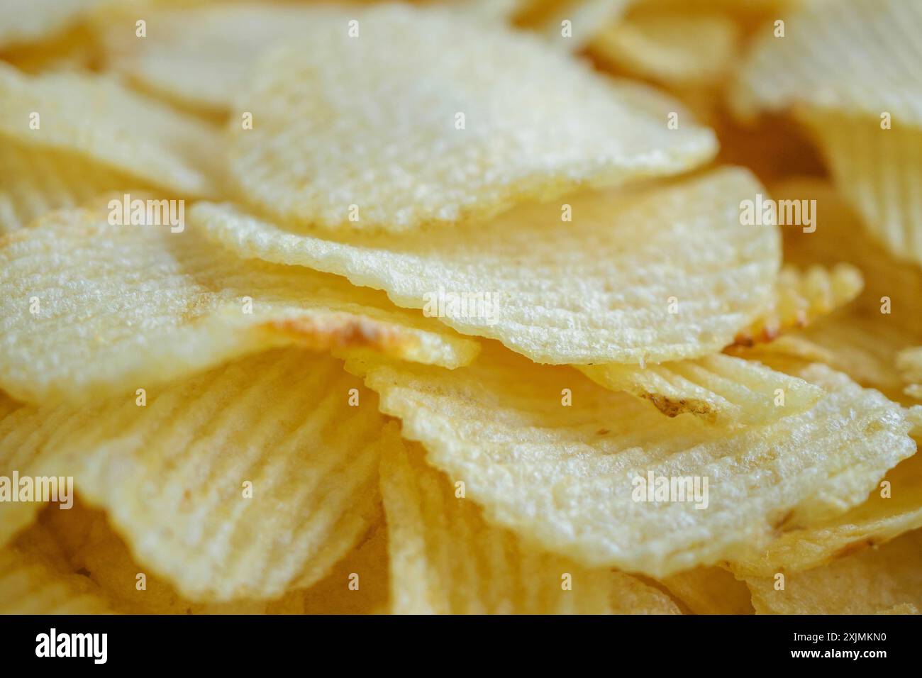 crispy potato chips snack texture background Stock Photo - Alamy