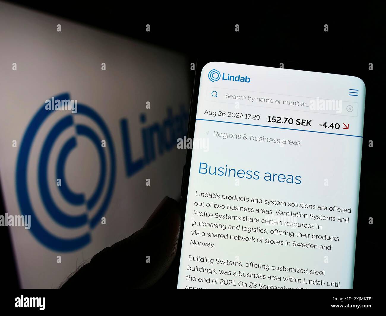 Stuttgart, Germany, 08-28-2022: Person holding cellphone with webpage ...