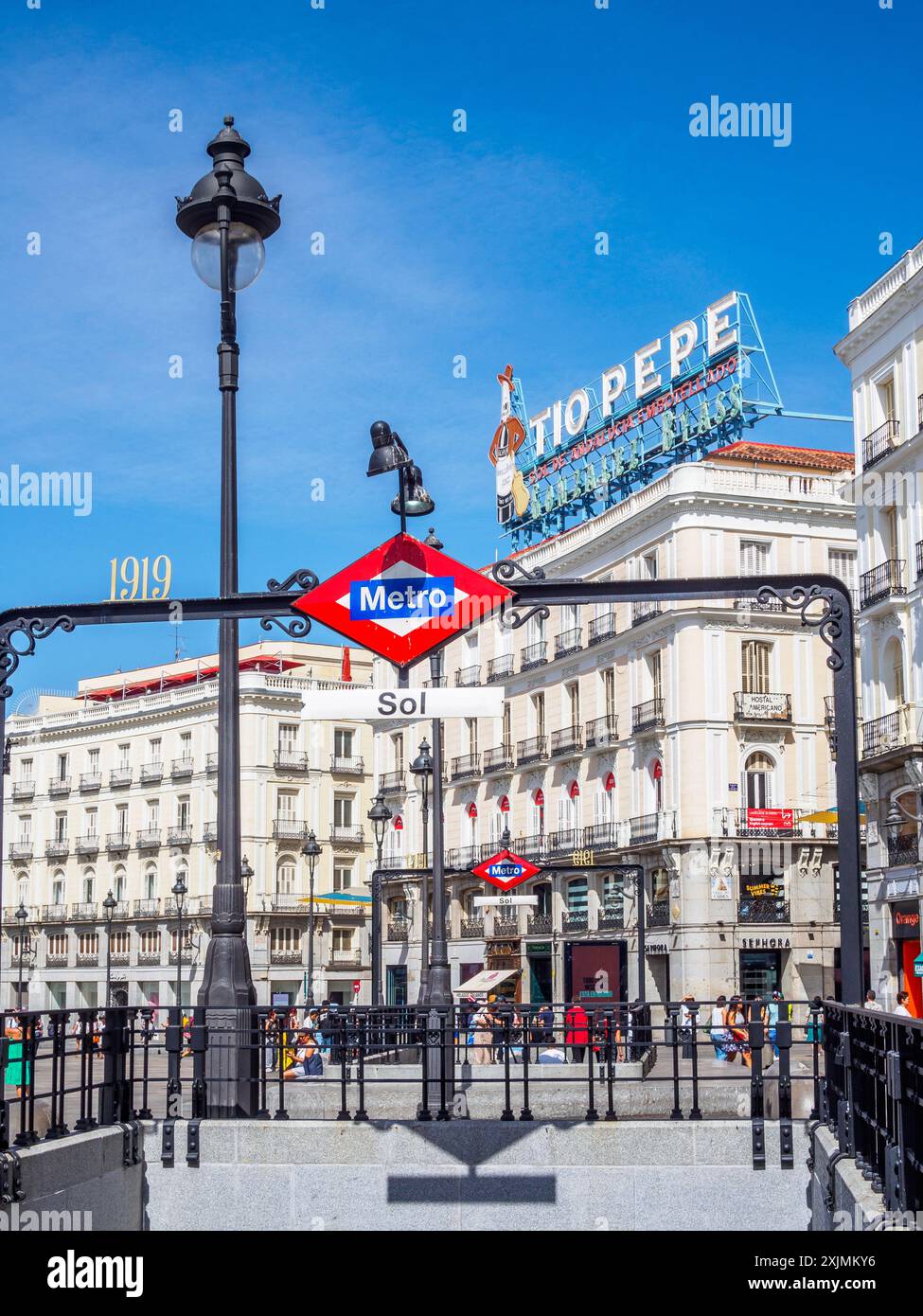 Sol Metro subway station sign on a sunny day, with the Tio Pepe neon ...