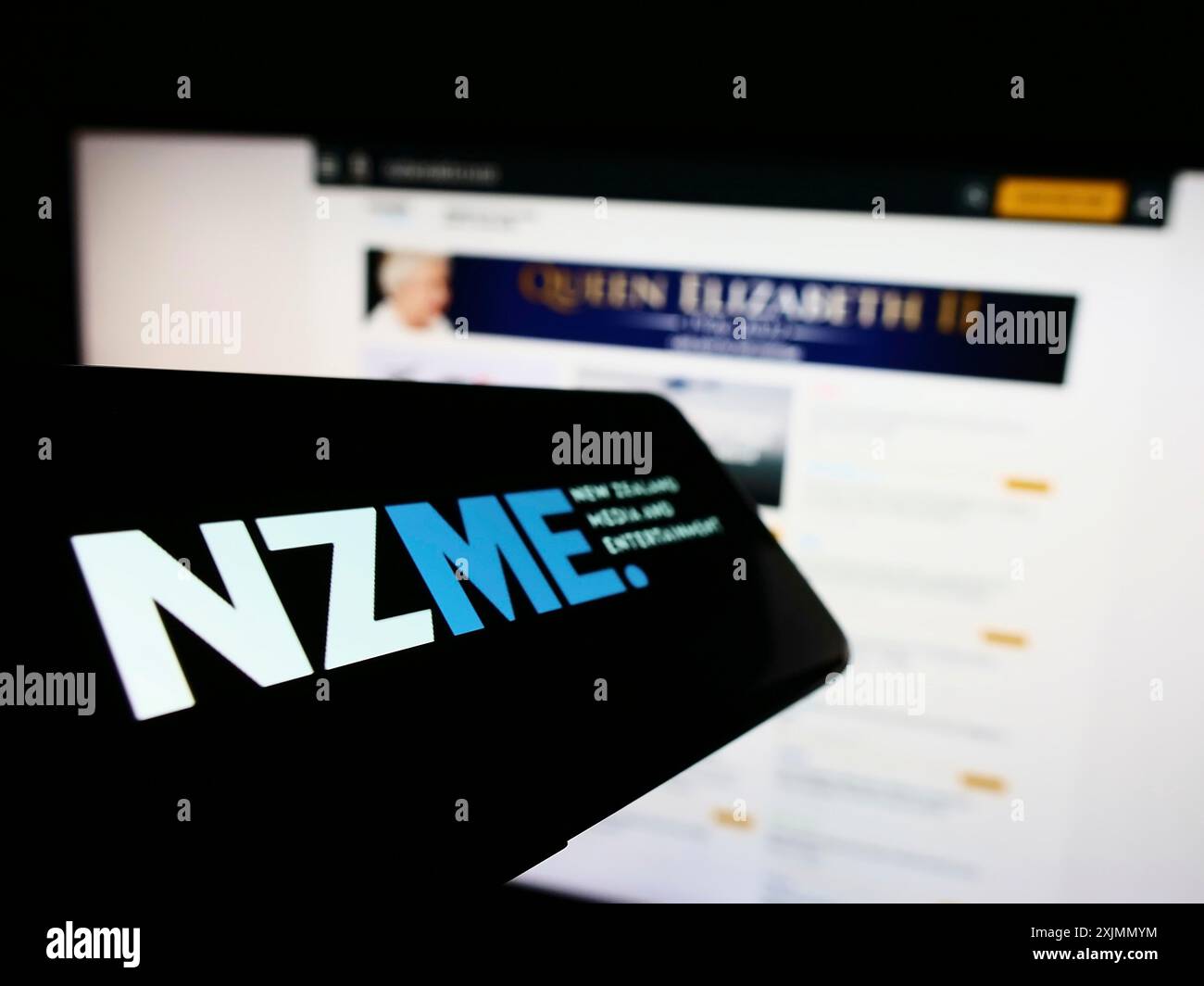 Mobile phone with logo of company New Zealand Media and Entertainment ...