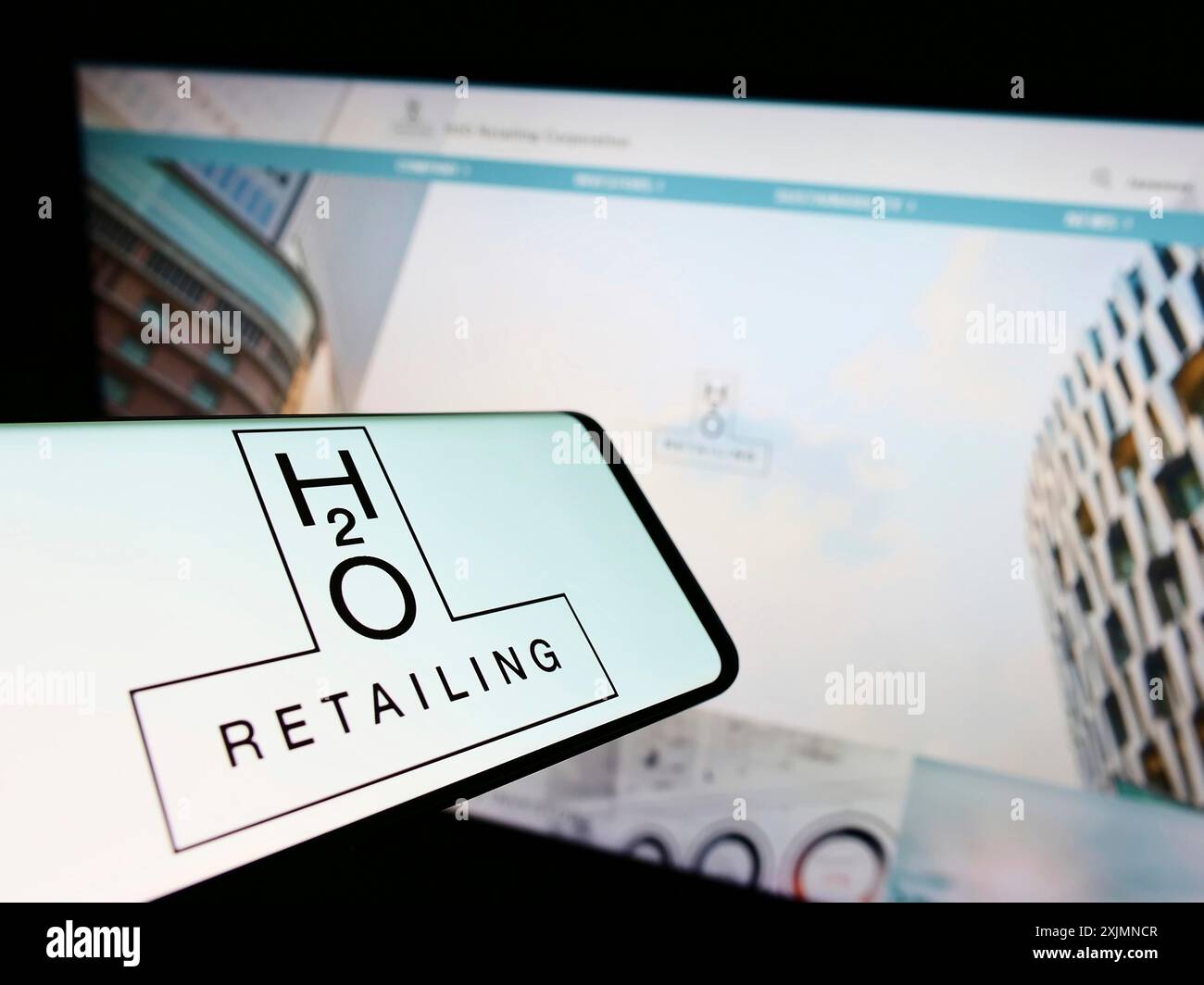 Stuttgart, Germany, 09-15-2022: Mobile phone with logo of Japanese company H2O Retailing ...
