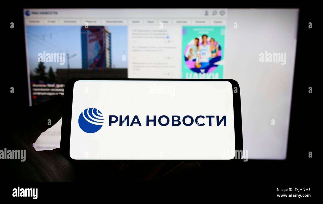 Stuttgart, Germany, 09-19-2022: Person holding cellphone with logo of ...