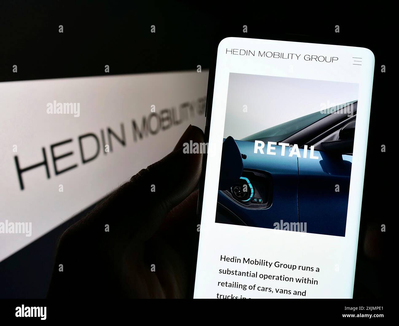 Stuttgart, Germany, 09-30-2022: Person holding cellphone with webpage ...