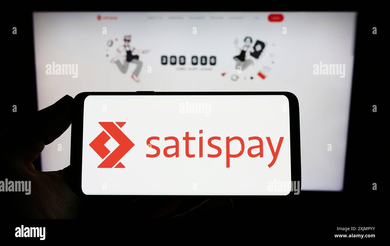 Stuttgart, Germany, 10-01-2022: Person holding smartphone with logo of ...