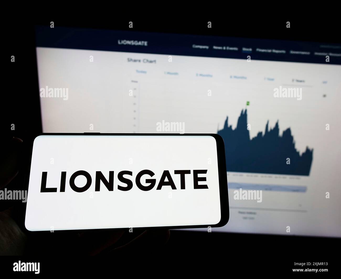 Stuttgart, Germany, 10-01-2022: Person holding mobile phone with logo of Lions Gate ...