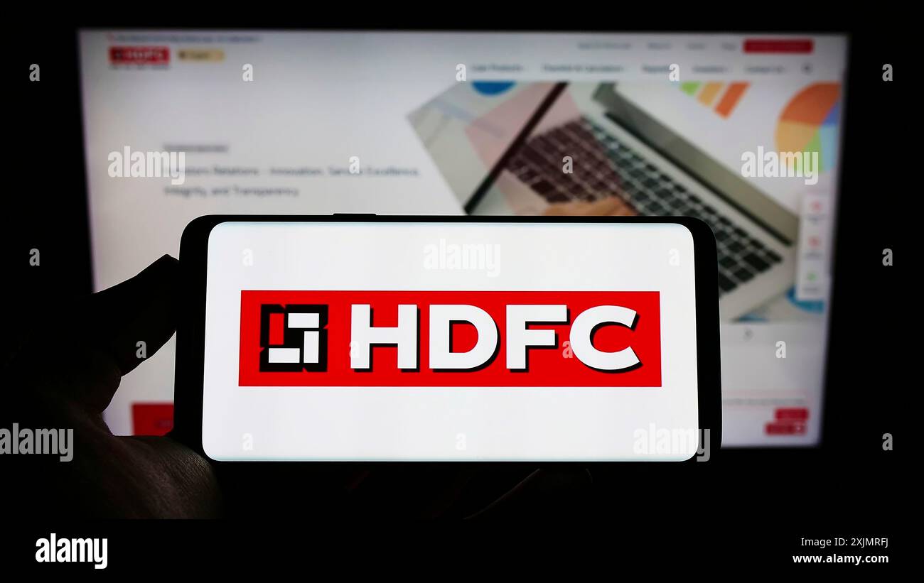 Stuttgart, Germany, 03-10-2022: Person holding mobile phone with logo ...