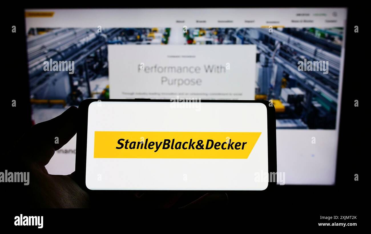 Stuttgart, Germany, 10-15-2022: Person holding cellphone with logo of ...