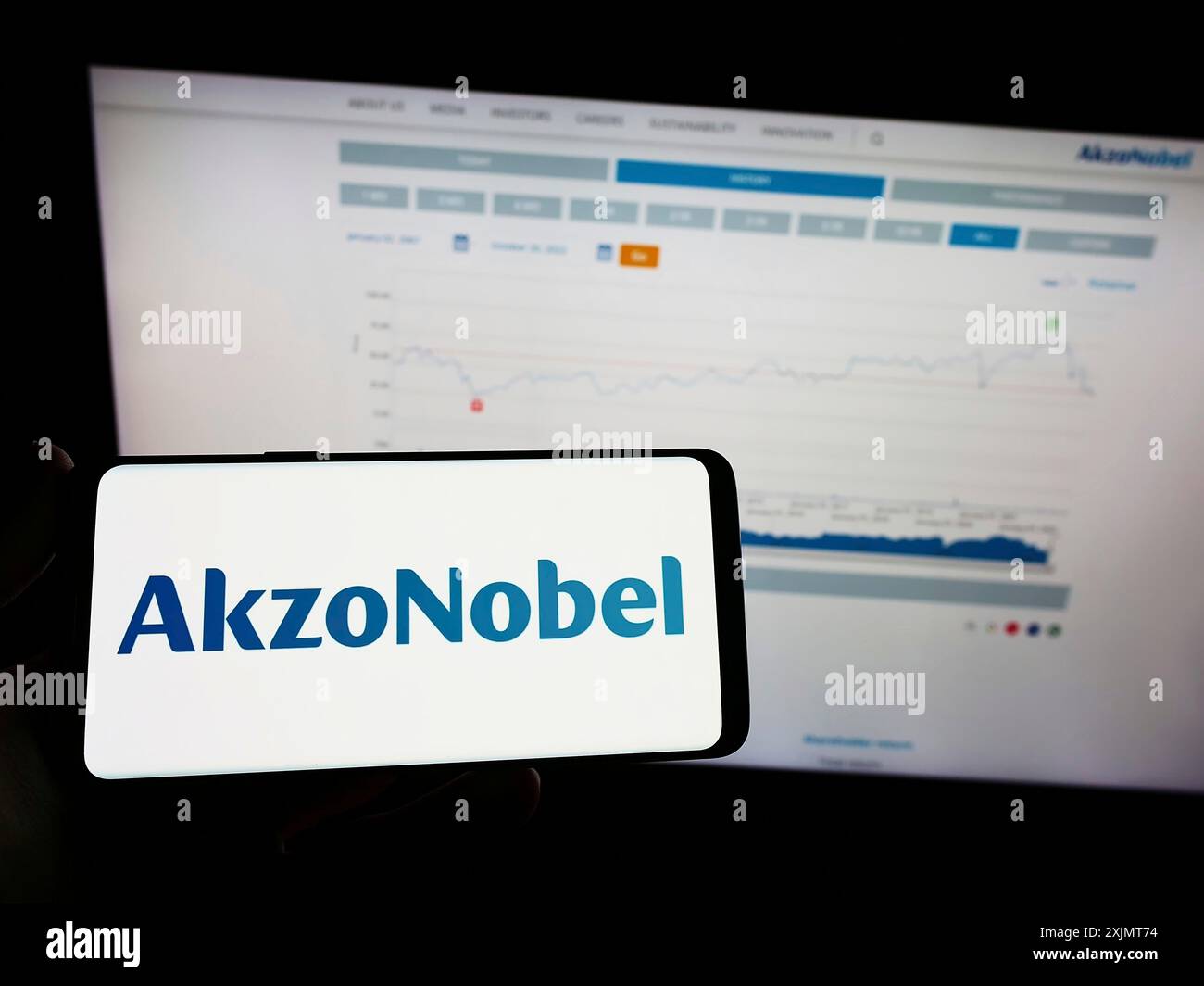 Stuttgart, Germany, 10-21-2022: Person holding mobile phone with logo ...