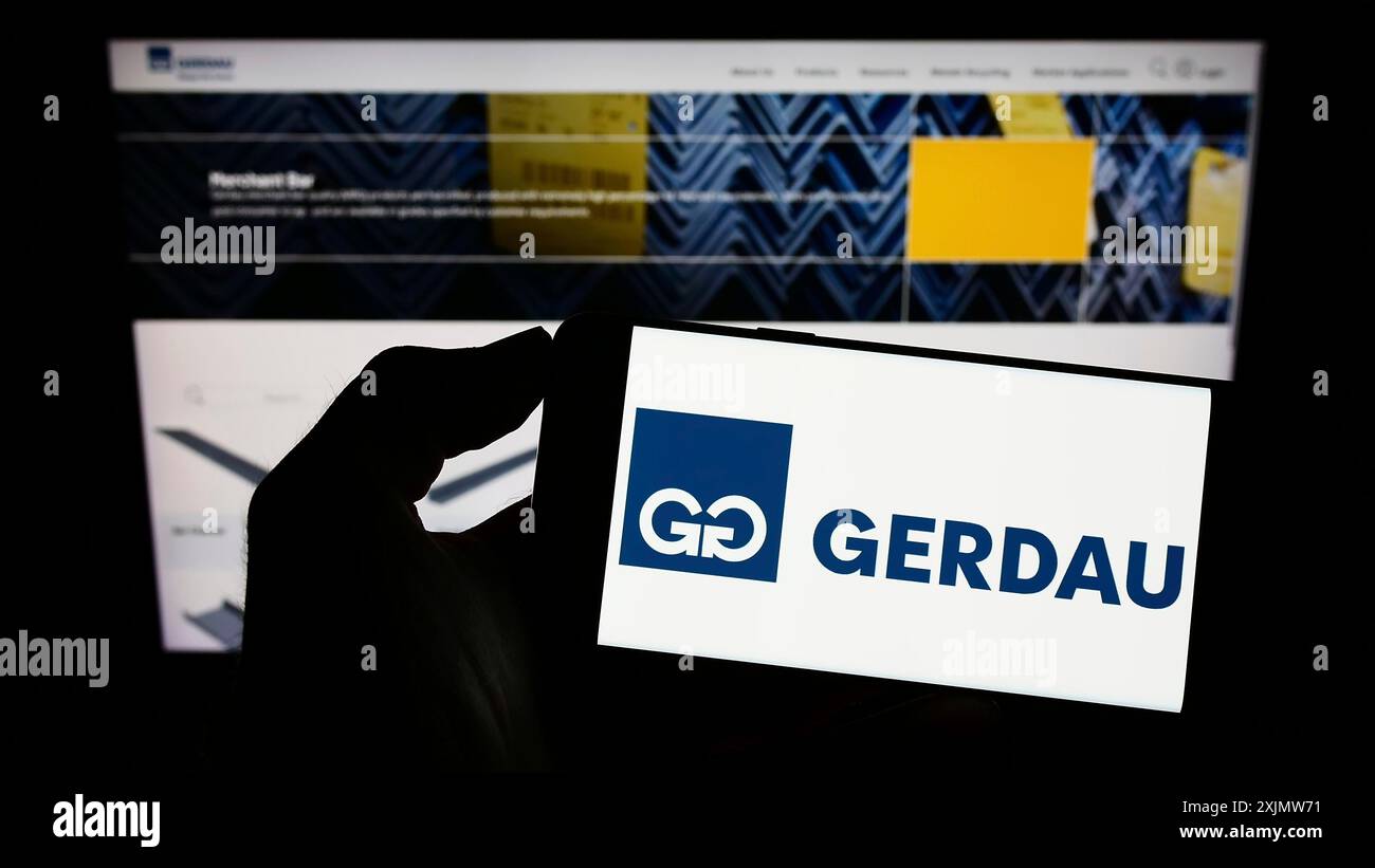 Stuttgart, Germany, 12-01-2022: Person holding cellphone with logo of ...