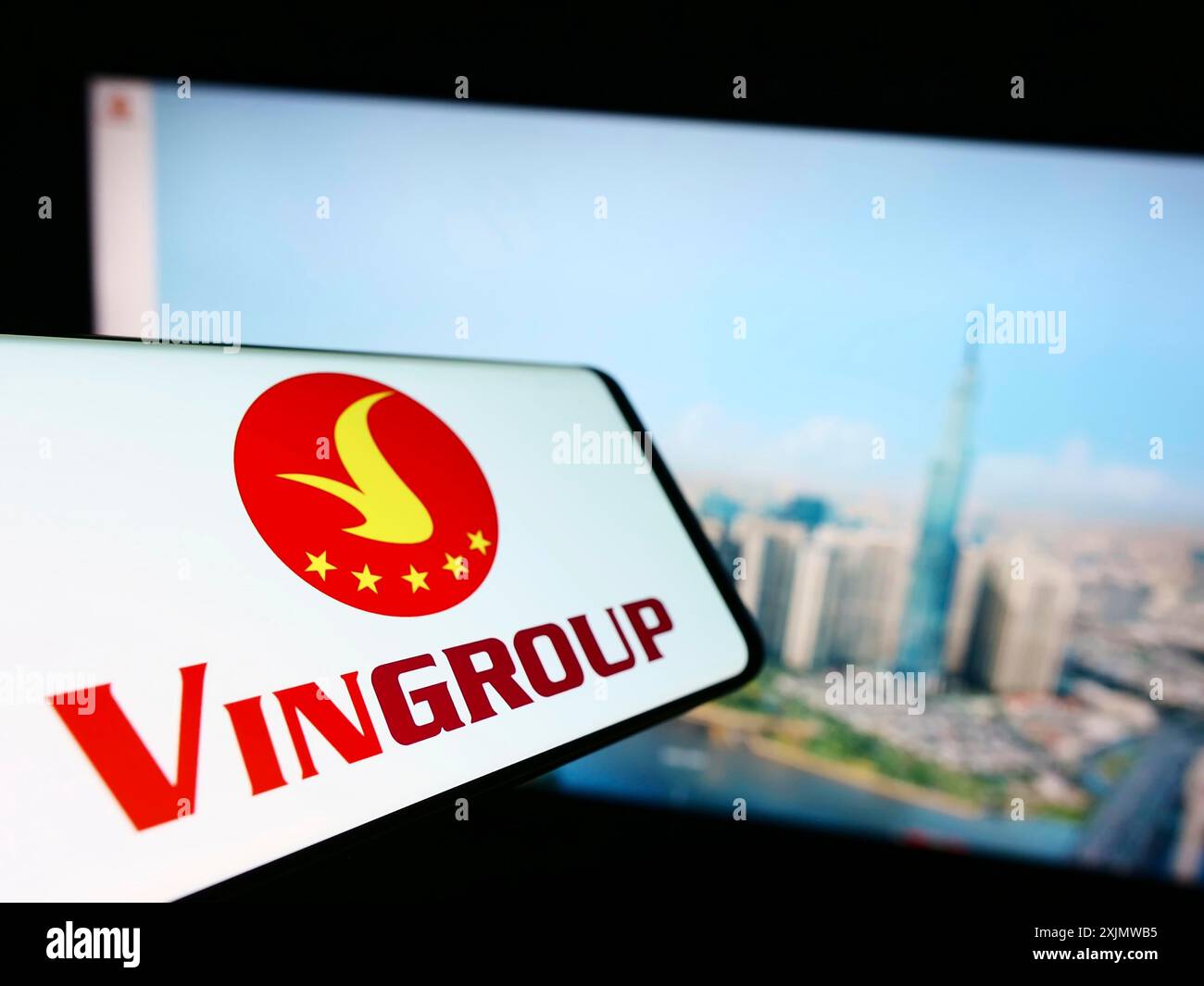 Stuttgart, Germany, 12-01-2022: Cellphone with logo of Vietnamese conglomerate Vingroup JSC on ...