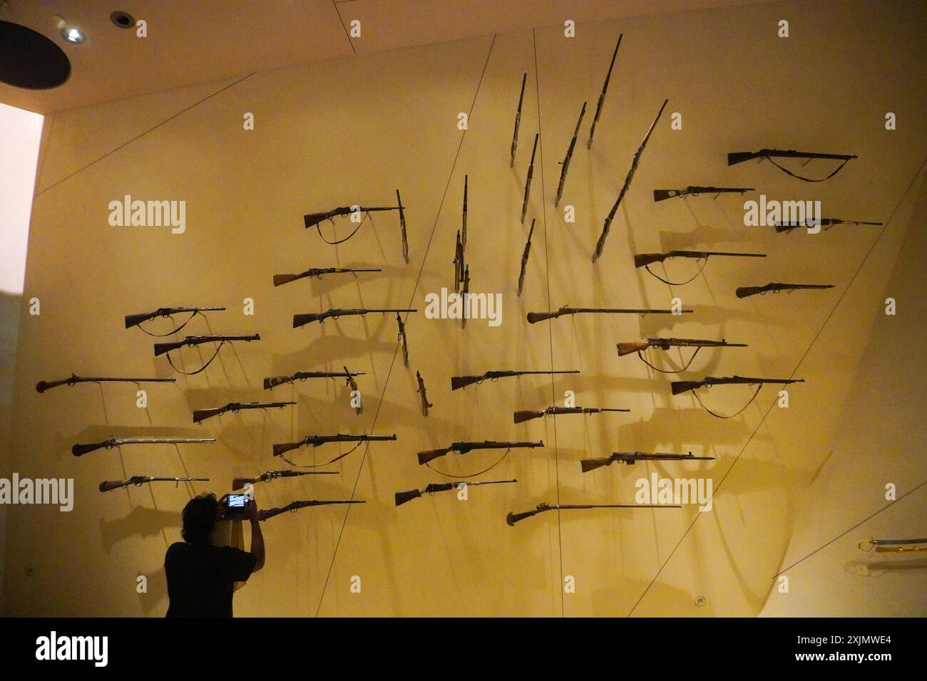 Old rifles inside the National Museum of Qatar In Doha, Qatar Stock ...