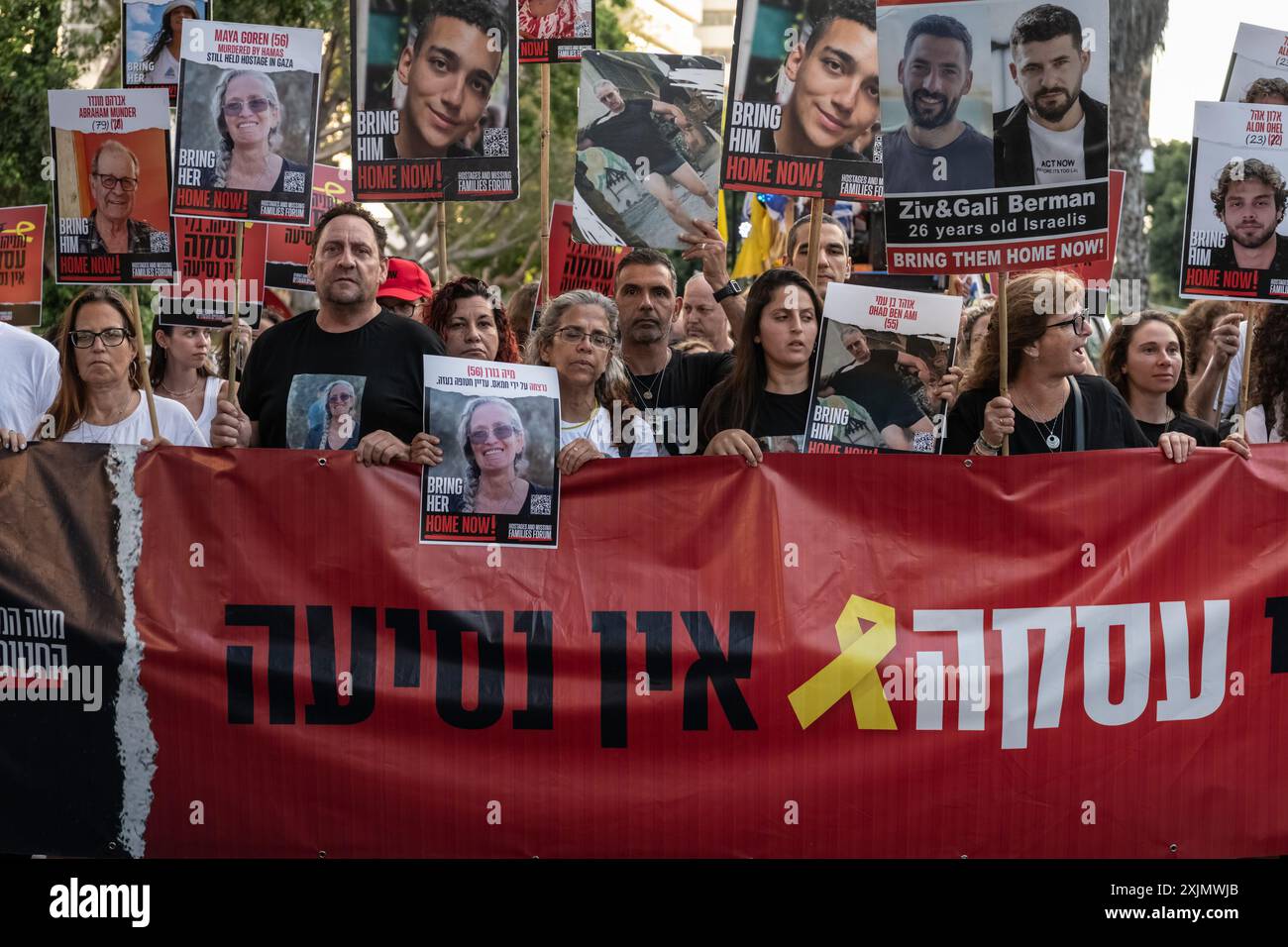 Placards with the motto “Secure a deal first, then fly", are shown ...